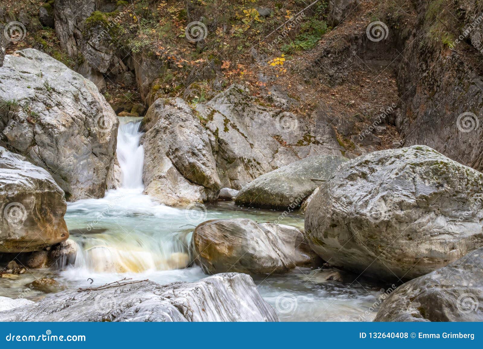 Waterfall and River between Stone Boulders in a Mountain Autumn Forest ...