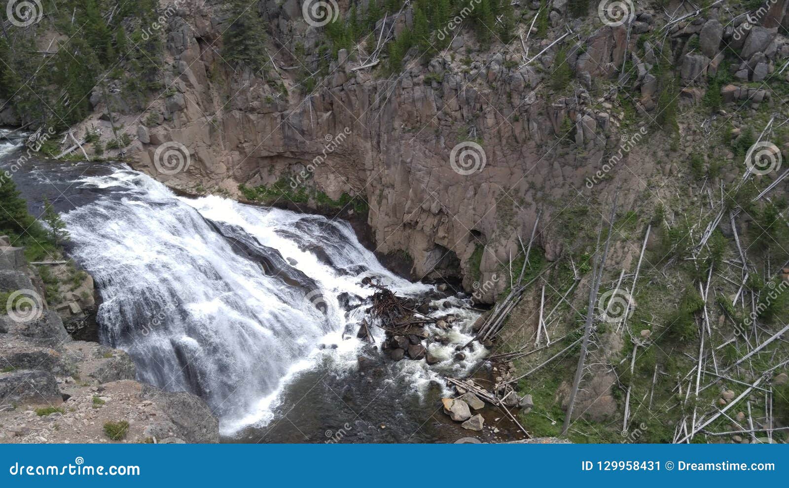 Waterfall into a river stock image. Image of river, waterfall - 129958431