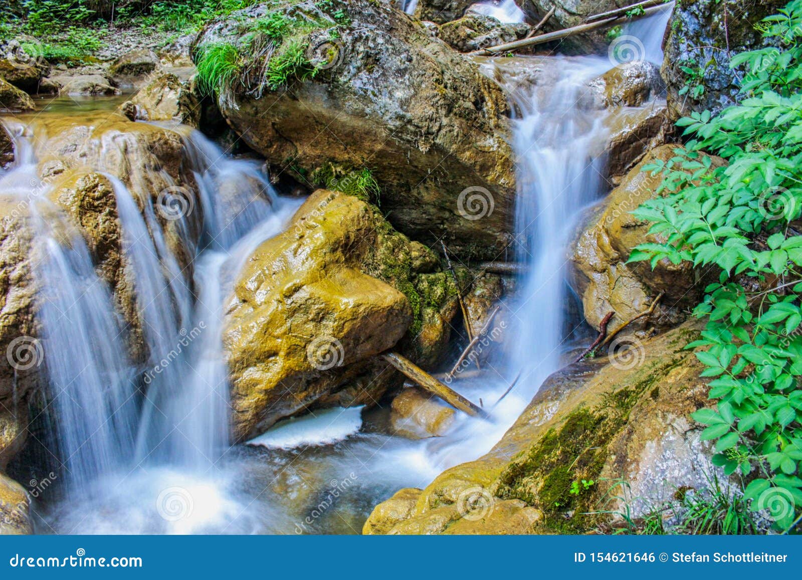 A Waterfall between the Rocks Stock Photo - Image of cascade, cliff ...