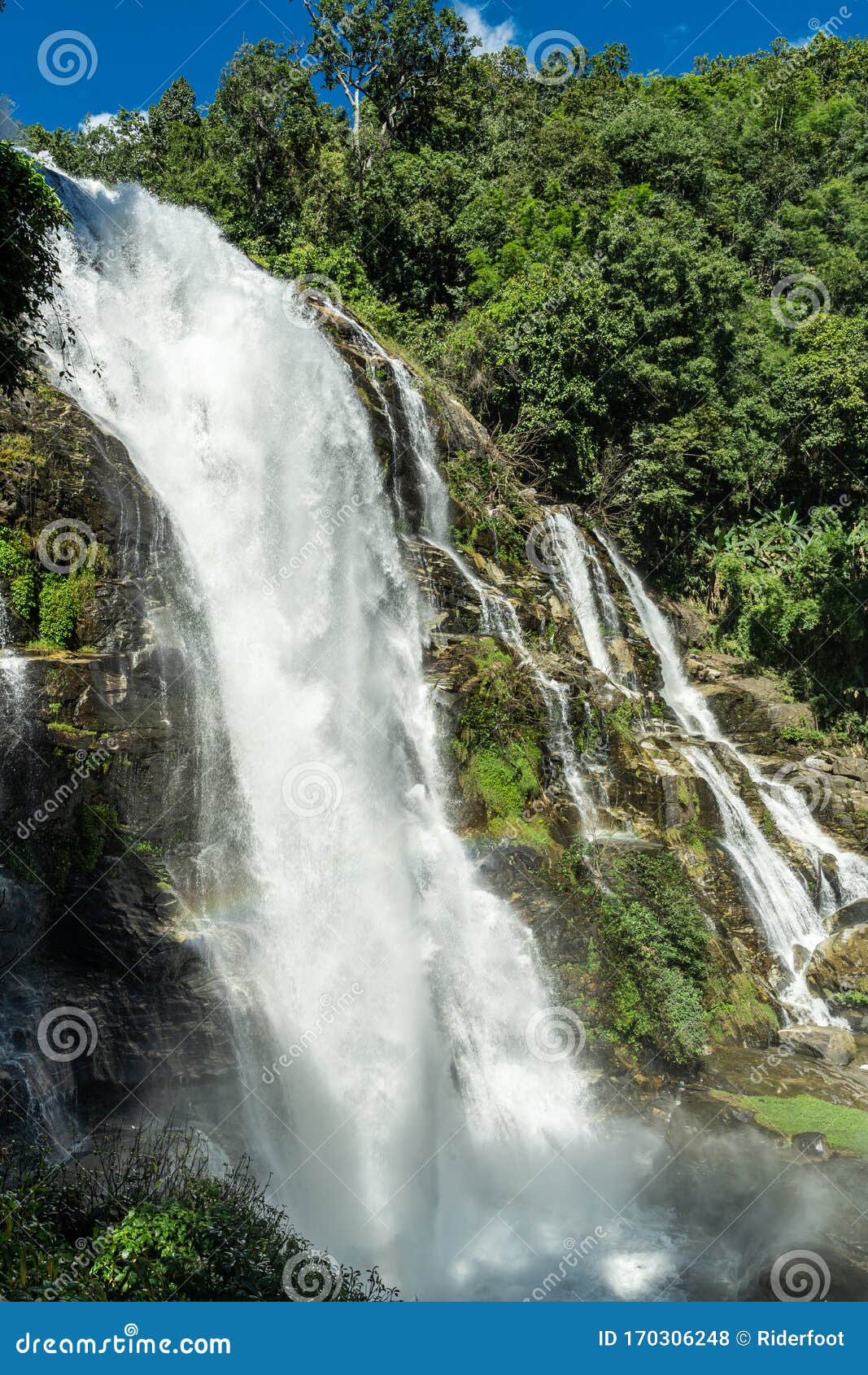 Waterfall with Rocks in the Middle of the Jungle Stock Photo - Image of ...