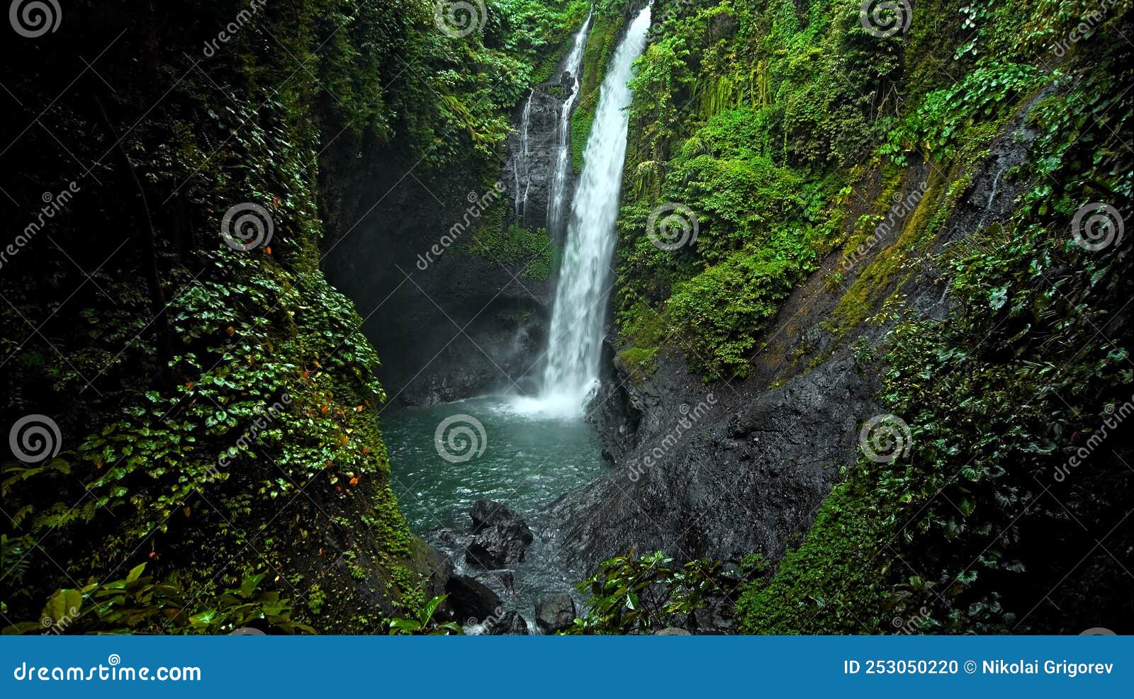 Waterfall with Rocks among Tropical Jungle with Green Plants and Trees ...