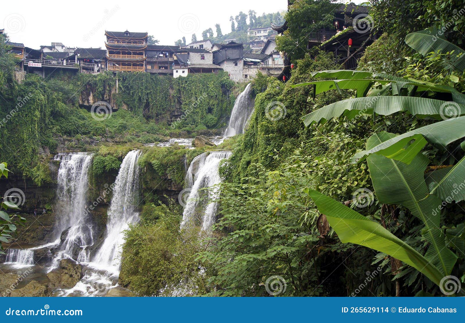 Waterfall Running through the Town of Furong, China Stock Photo - Image ...