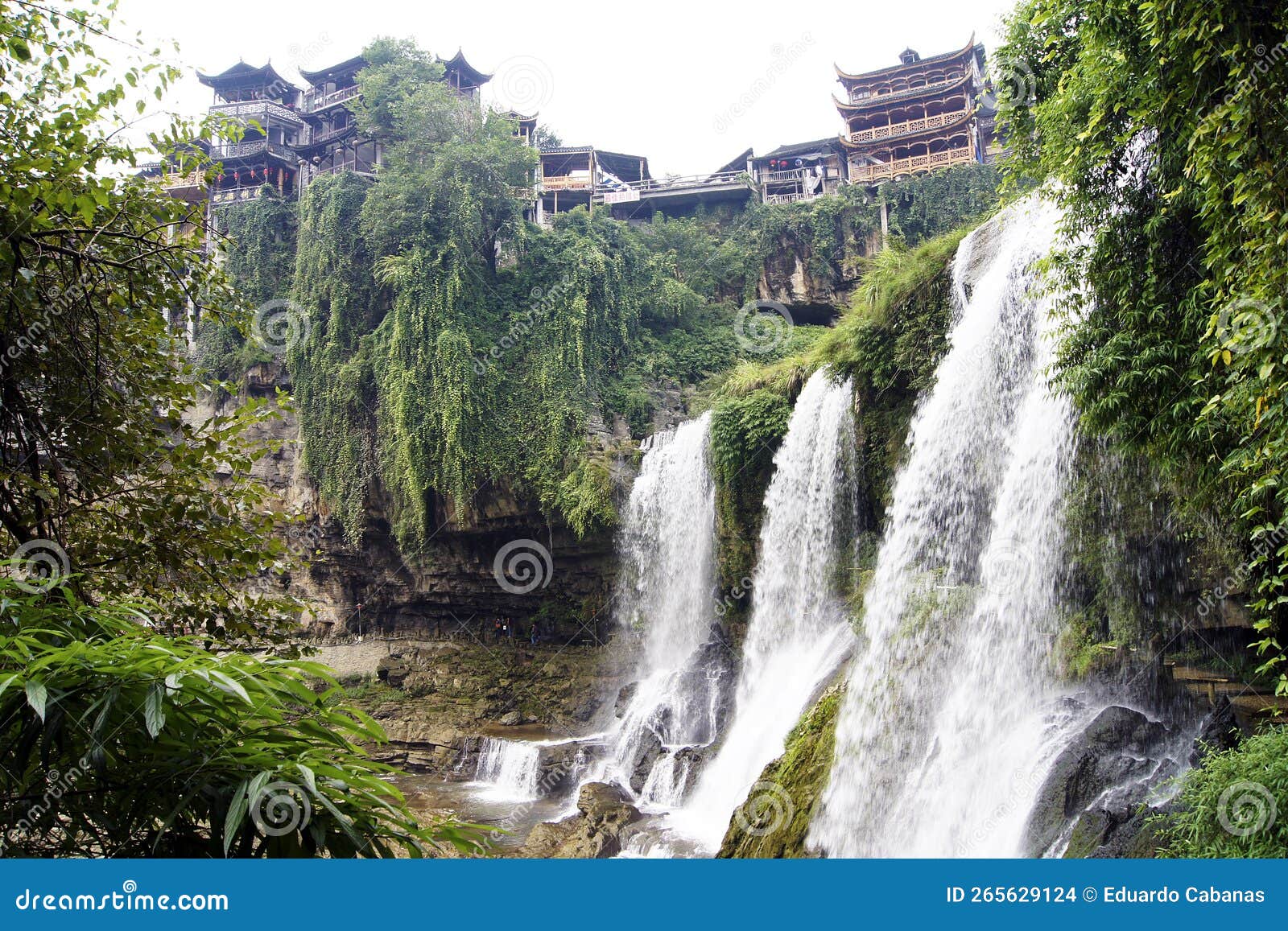 Waterfall Running through the Town of Furong, China Stock Photo - Image ...
