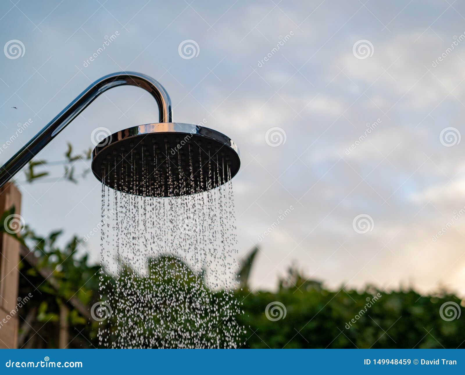 Waterfall Showerhead Outside in Evening Sky and Water Streaming Down ...