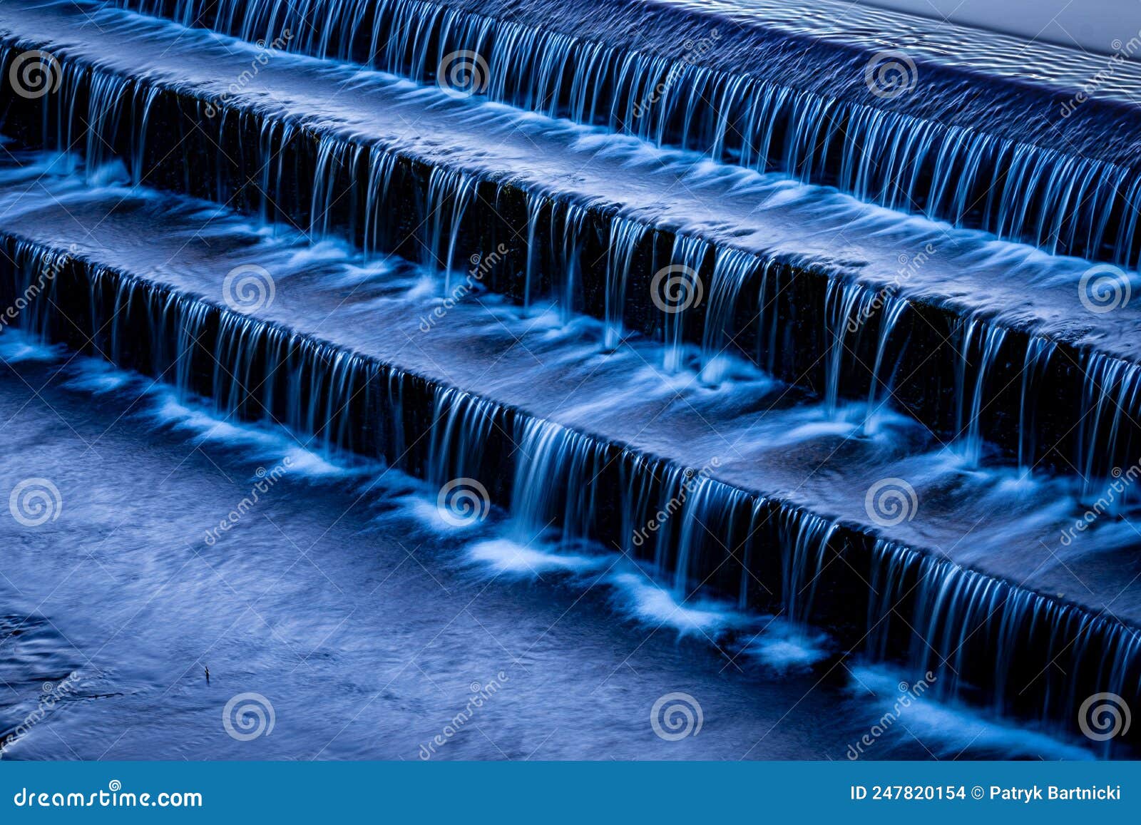 A Waterfall With Smooth Silky Falling Water In A Dense Forest Royalty ...