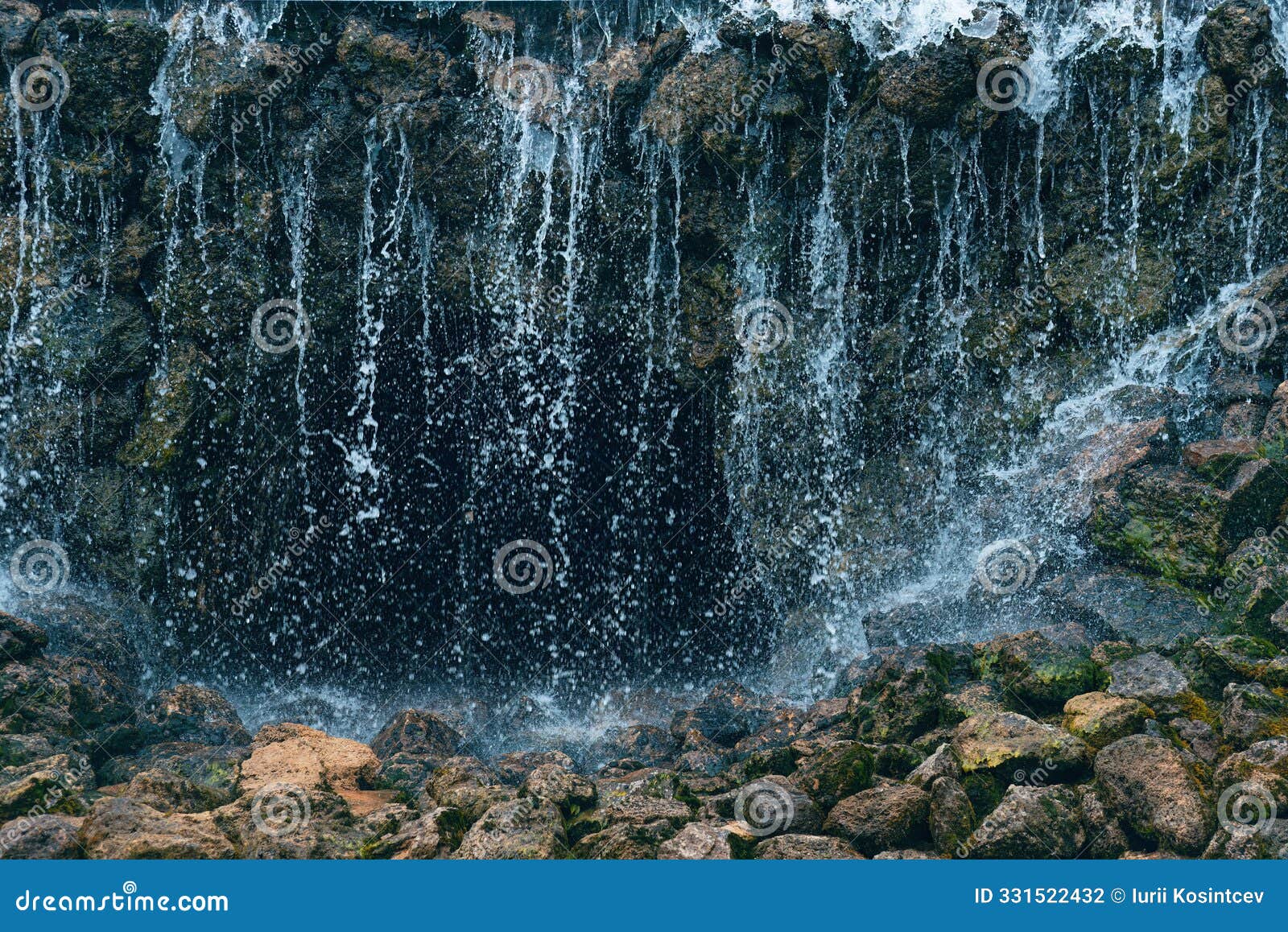 Waterfall with Splashes of Water with Wet Cobblestones Stock Photo ...