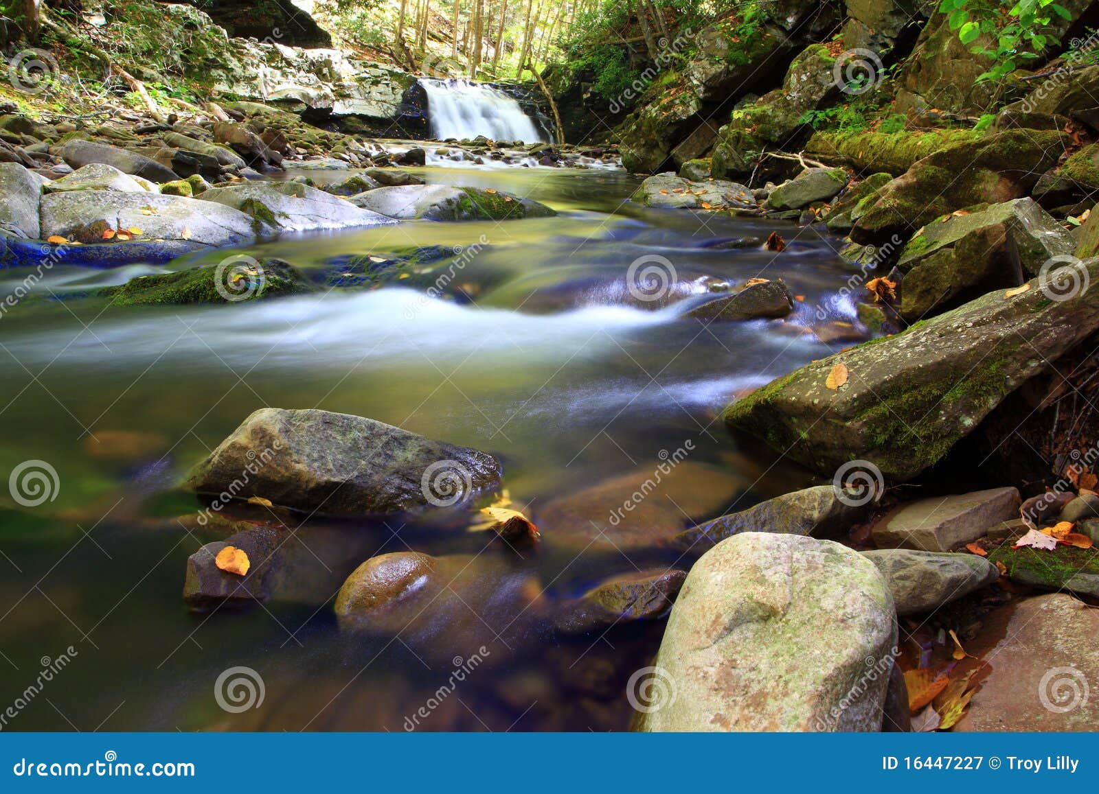 Waterfall and stream stock image. Image of rock, hidden - 16447227