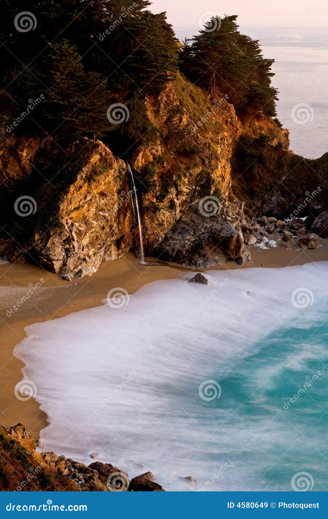 Waterfall at sunset stock image. Image of coastline, central - 4580649