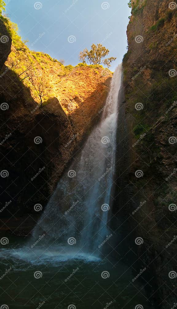 Waterfall Tanur stock photo. Image of light, orange, falls - 8761936