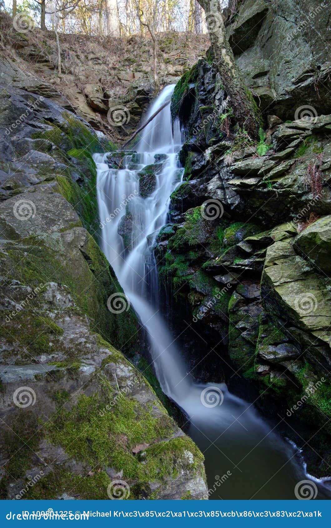 Waterfall between Two Rocks in the Forest Stock Image - Image of season ...