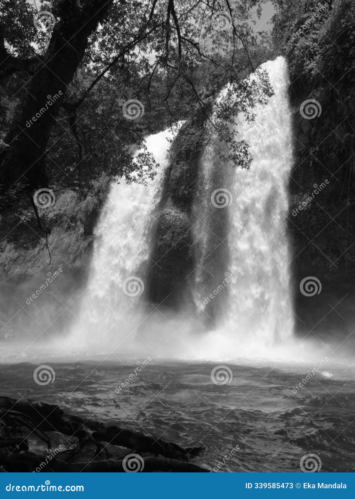 A Waterfall with Two Waterfalls in the Foreground and One in the ...