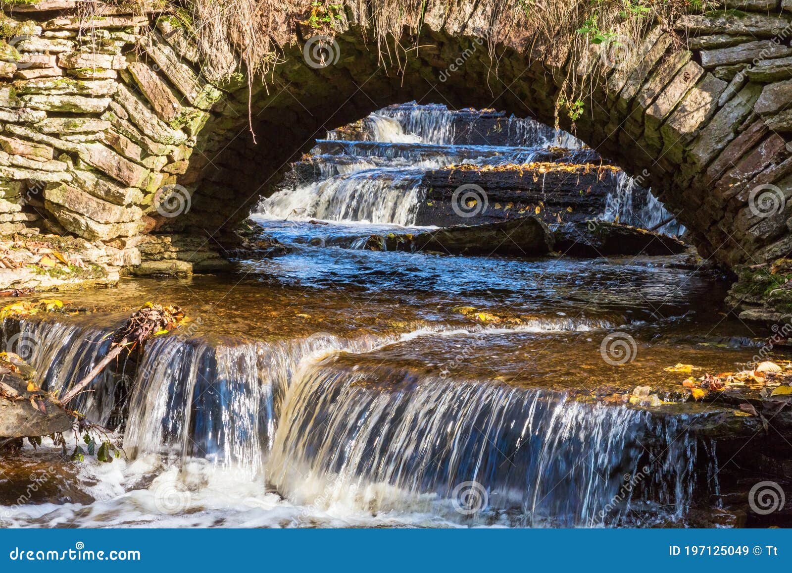 Waterfall Under an Old Arch Bridge Stock Image - Image of stone ...