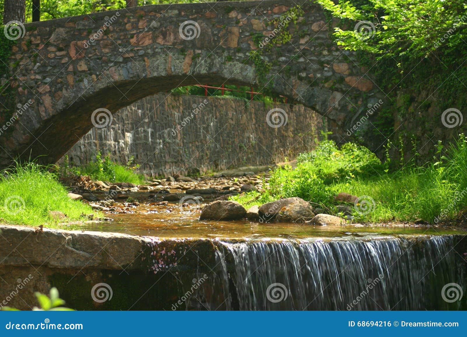 Waterfall Under a Stone Bridge Stock Photo - Image of background, stone ...