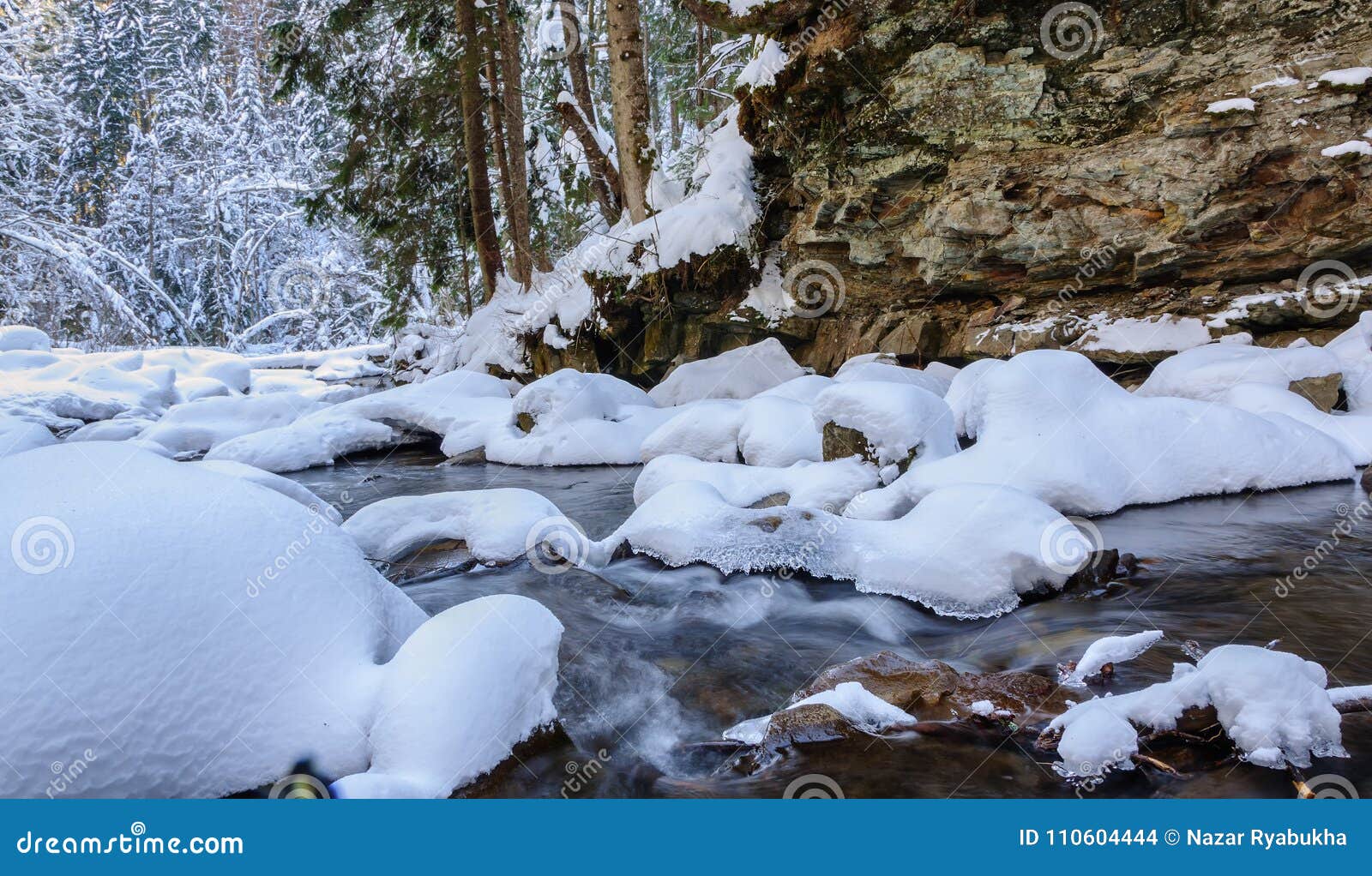 Waterfall in Winter. Mountain River and Snow on the Mountain Slopes ...