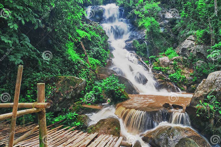 Waterfalls with bridge stock photo. Image of blurred - 17709028