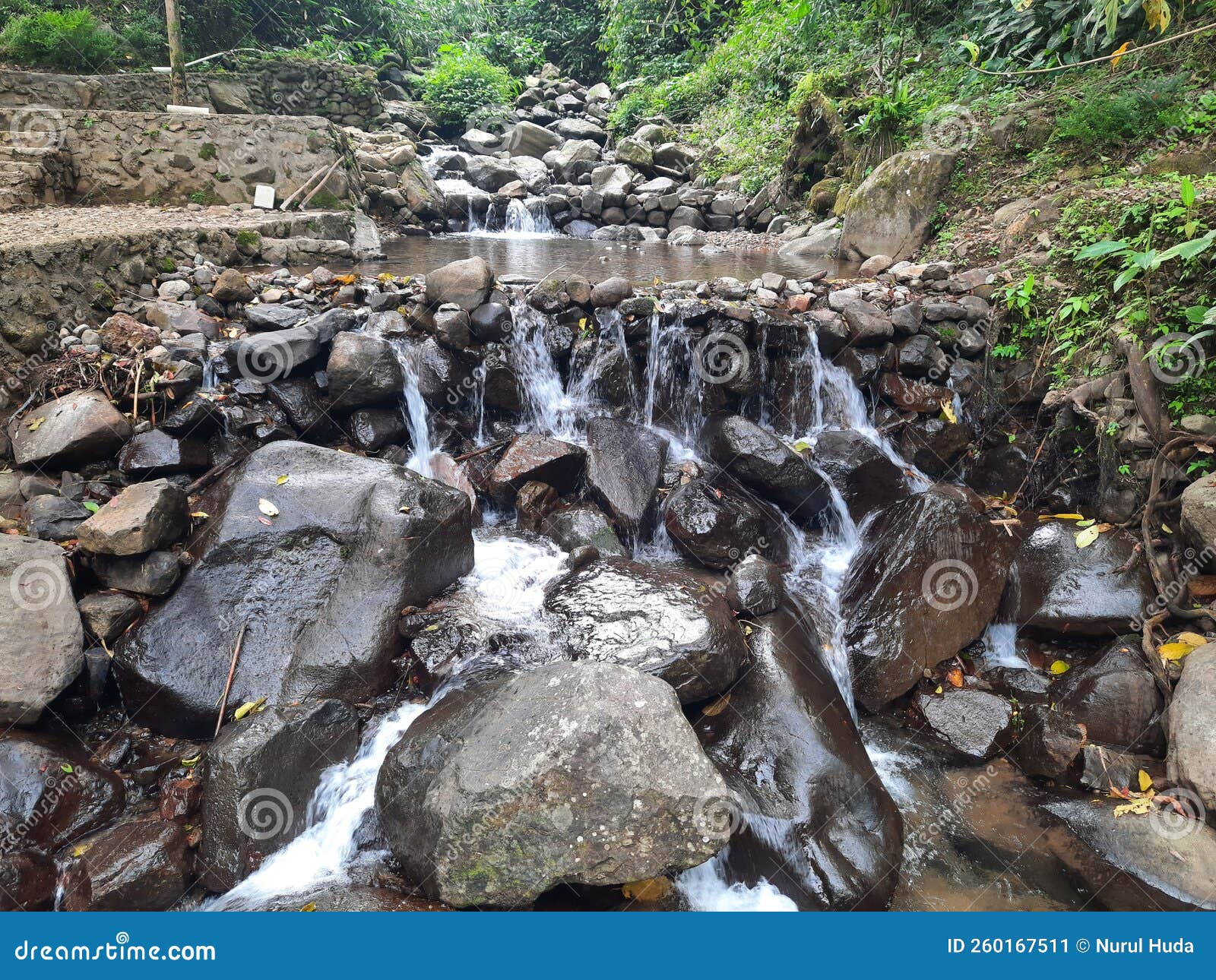 Waterfalls Flow on Rocks that are Arranged Naturally and Beautifully ...