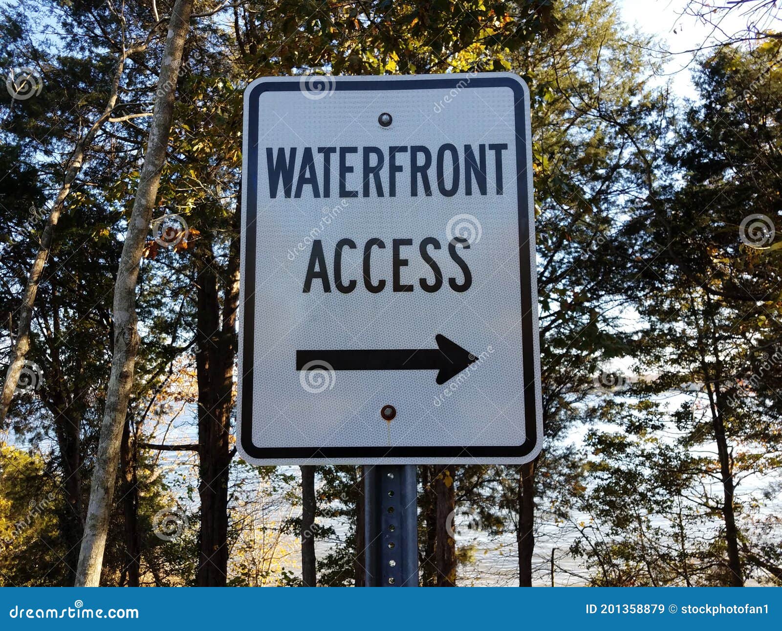 Waterfront Access Sign with Arrow and Trees Stock Image - Image of ...