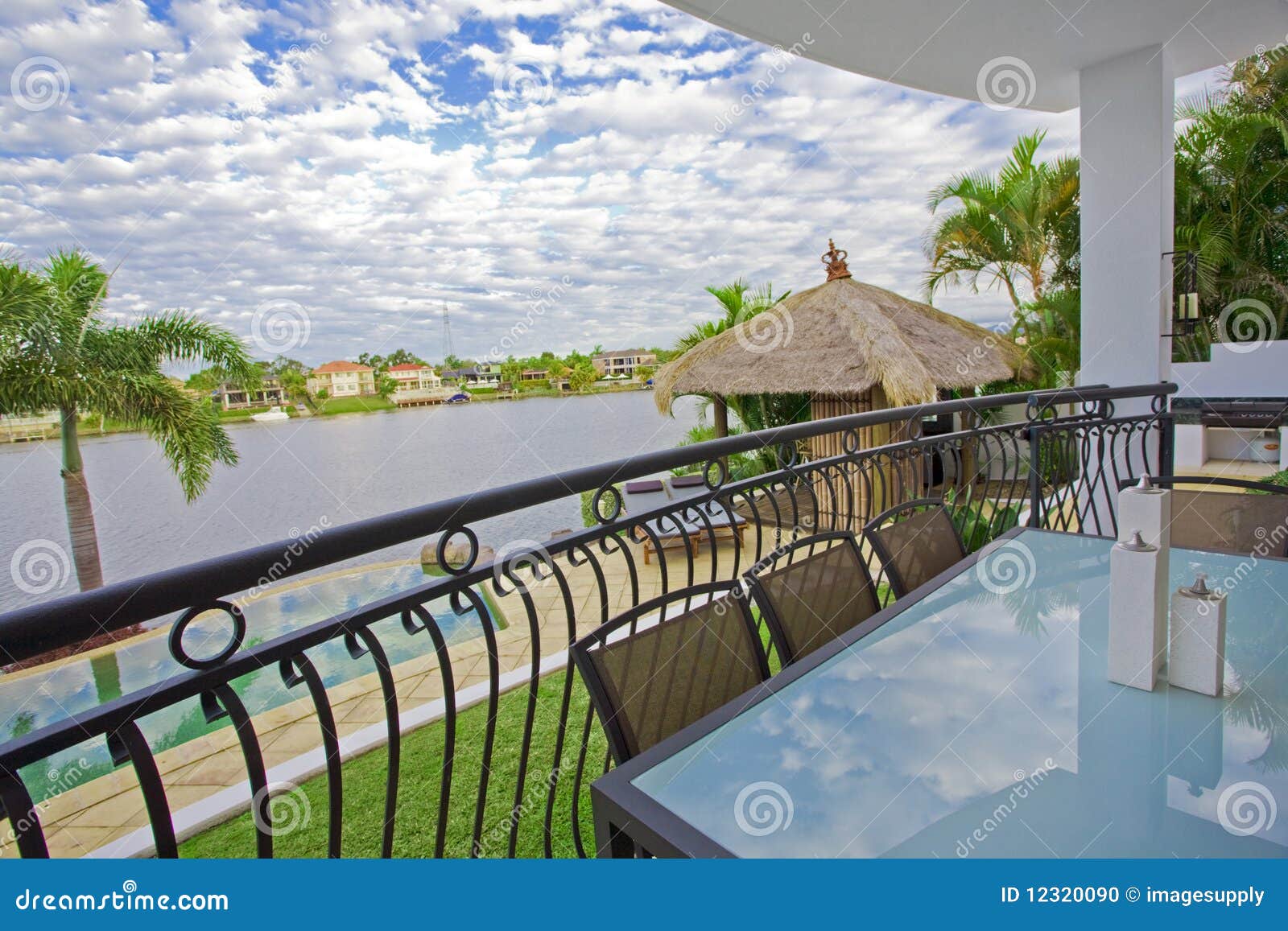 Waterfront Balcony Entertainment Area Stock Photo - Image of ...
