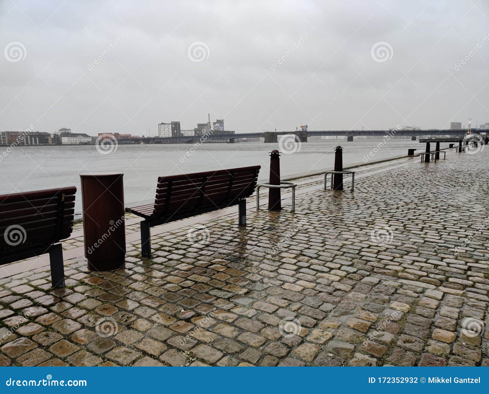 Waterfront with Buildings and Bridge in Background Stock Photo - Image ...