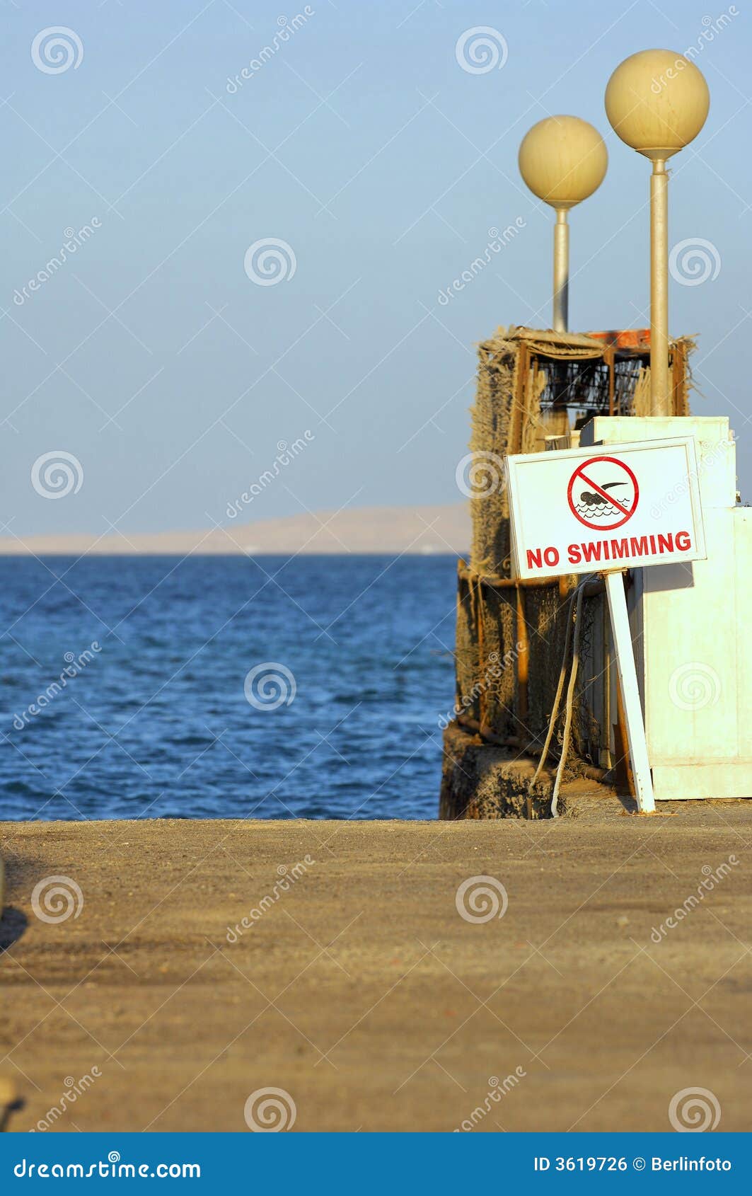 Waterfront dock and sign stock photo. Image of signal - 3619726