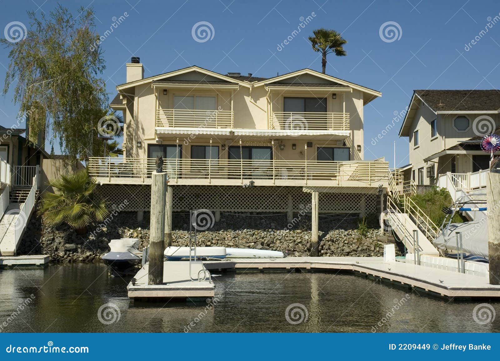 Waterfront home with dock stock image. Image of driveway - 2209449
