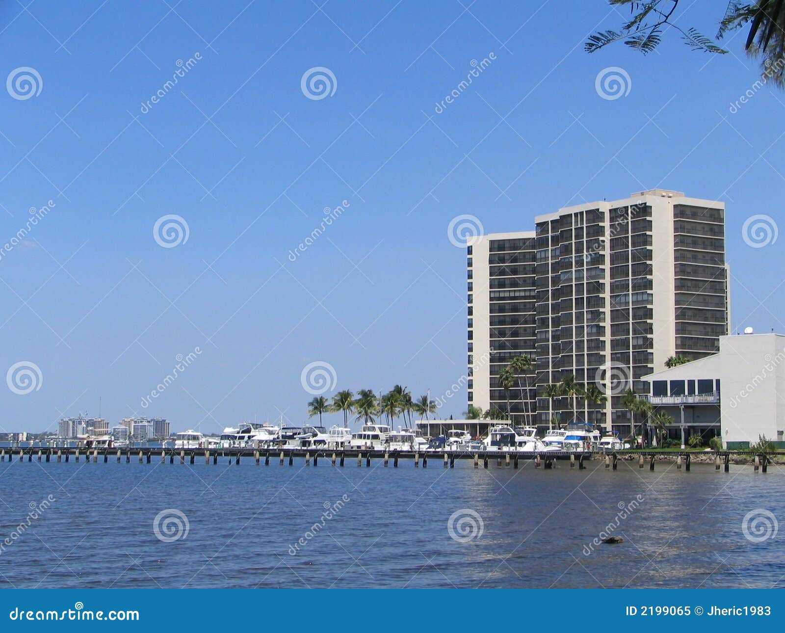 Waterfront Hotel stock image. Image of blue, tropics, tree - 2199065