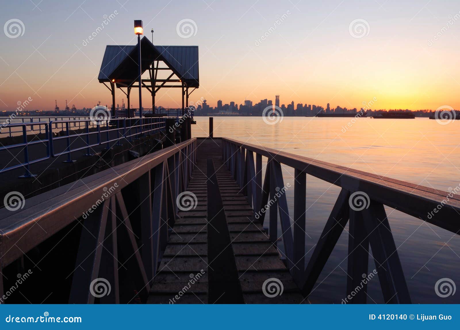Waterfront park at sunset stock photo. Image of hope, sunset - 4120140