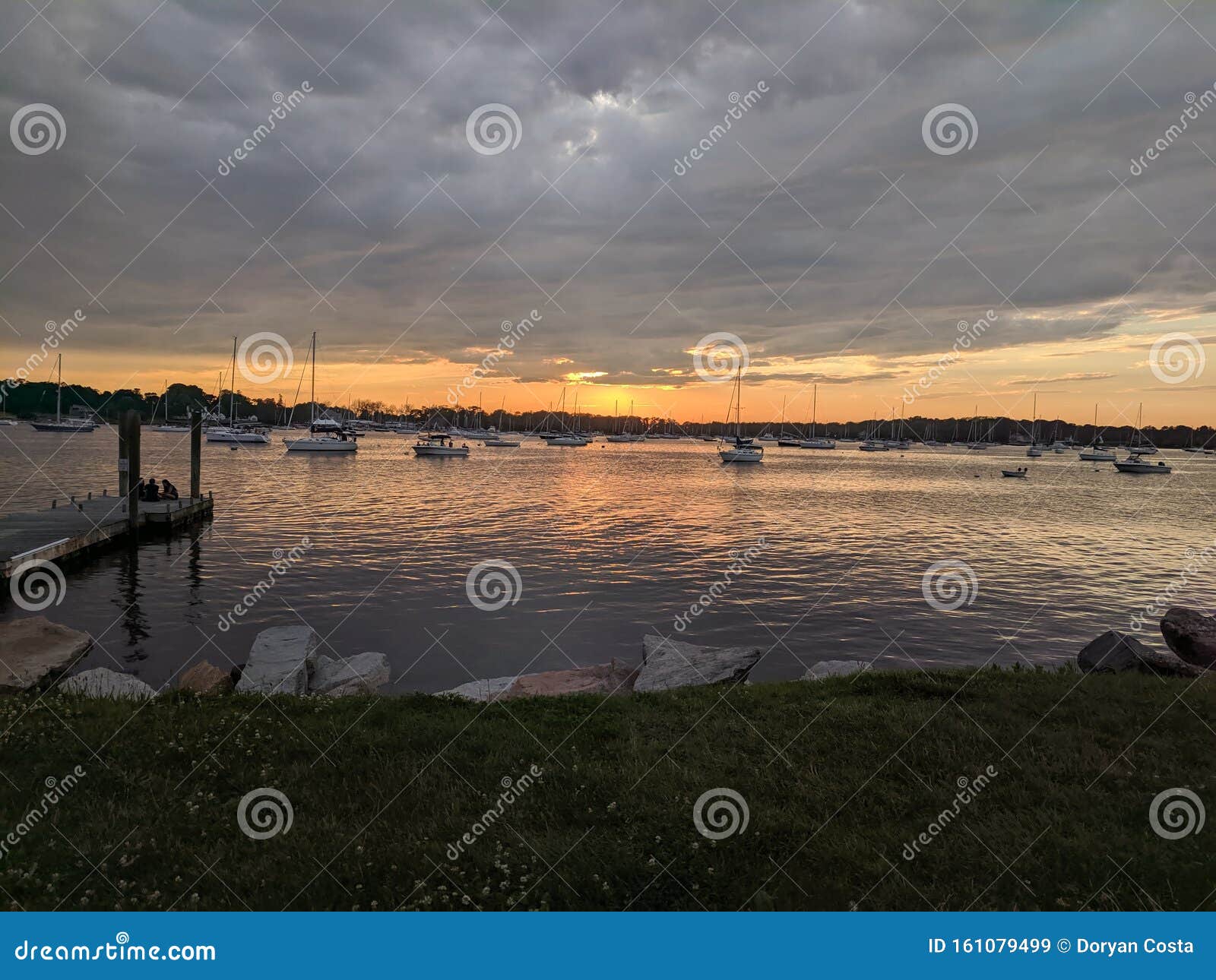 Waterfront sunset stock image. Image of waterfront, water - 161079499