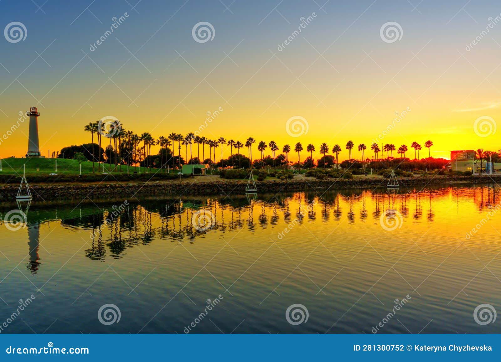 Waterfront View of the Lions Lighthouse at Sunset Stock Photo - Image ...