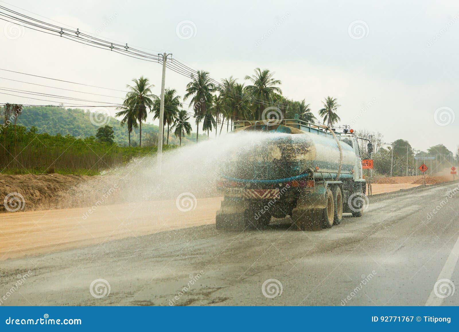 Watering the Dust on the Street Stock Image - Image of outdoor ...
