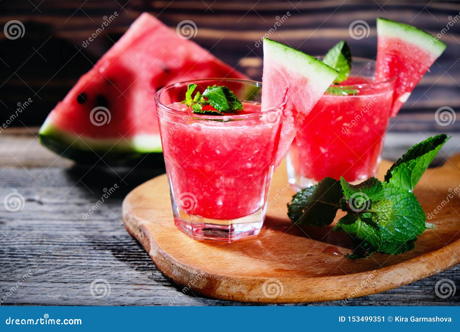 Watermelon Mojito with Watermelon Garnish on Wooden Table Stock Image ...