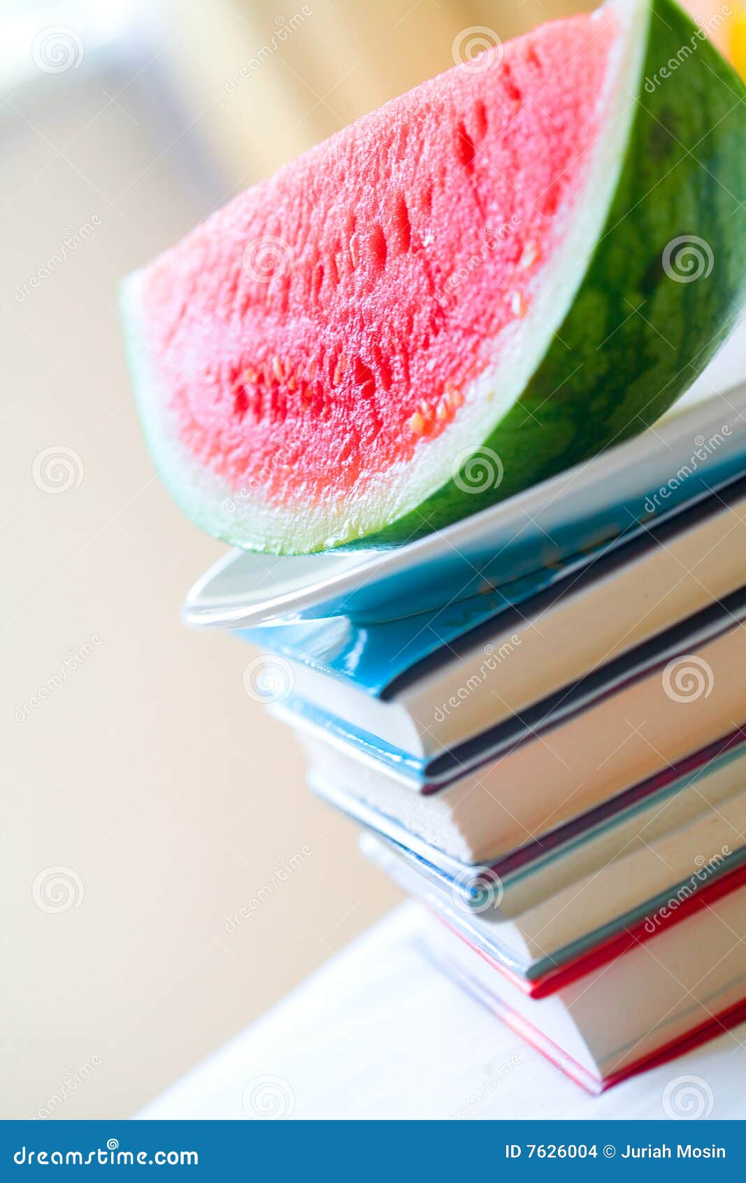 Watermelon on a Pile of Books Stock Photo - Image of fresh, round: 7626004