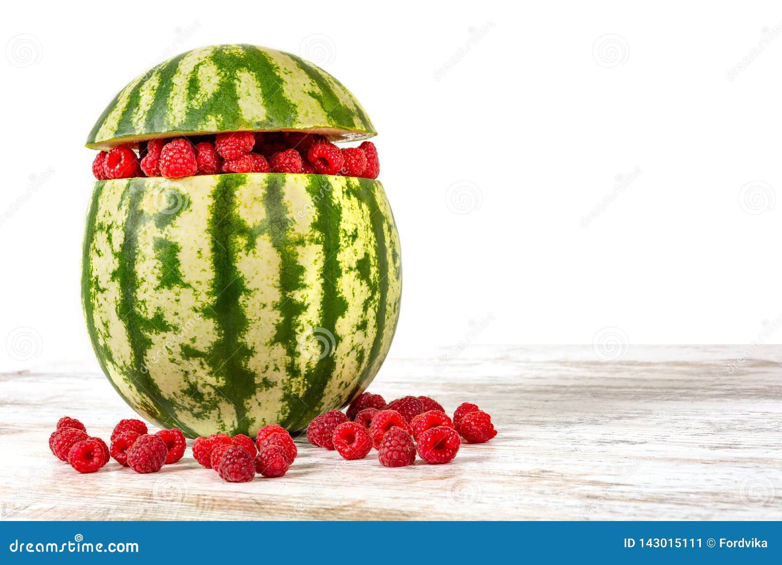 Watermelon with Raspberries on a White Background, Close-up. Stock ...