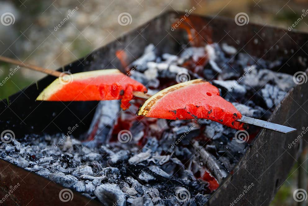 Watermelon on a Skewer is Fried on a Fire Stock Photo - Image of sliced ...