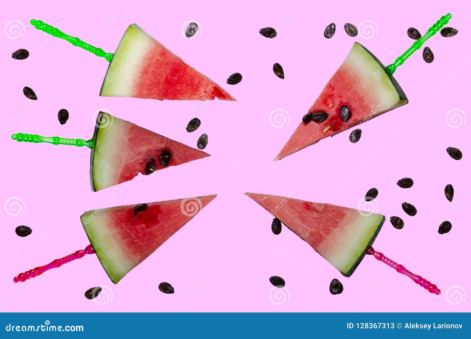 Watermelon Slices Cut into Triangles on Sticks, Watermelon Bones. Pink ...