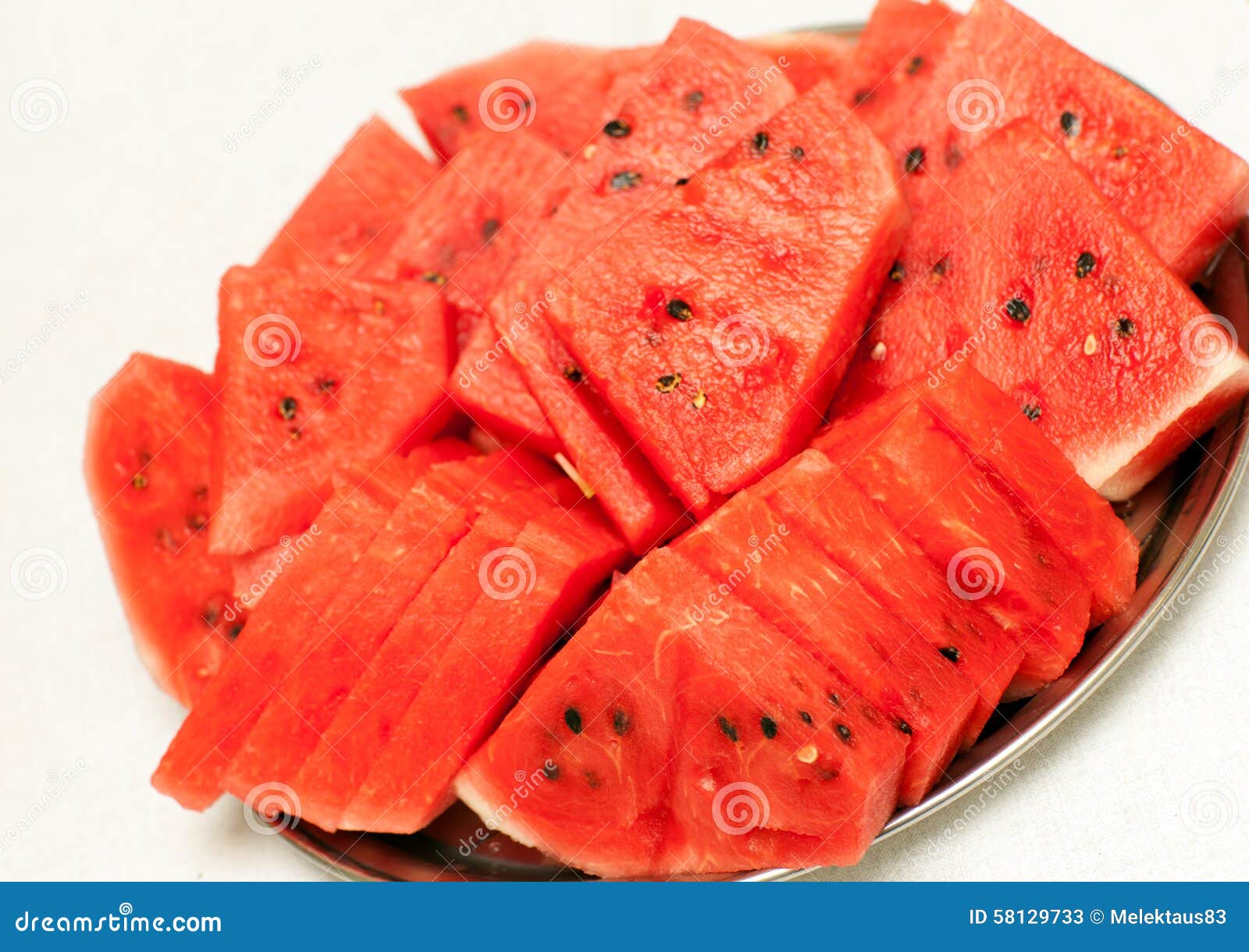 Watermelon on a tray stock image. Image of food, textured - 58129733