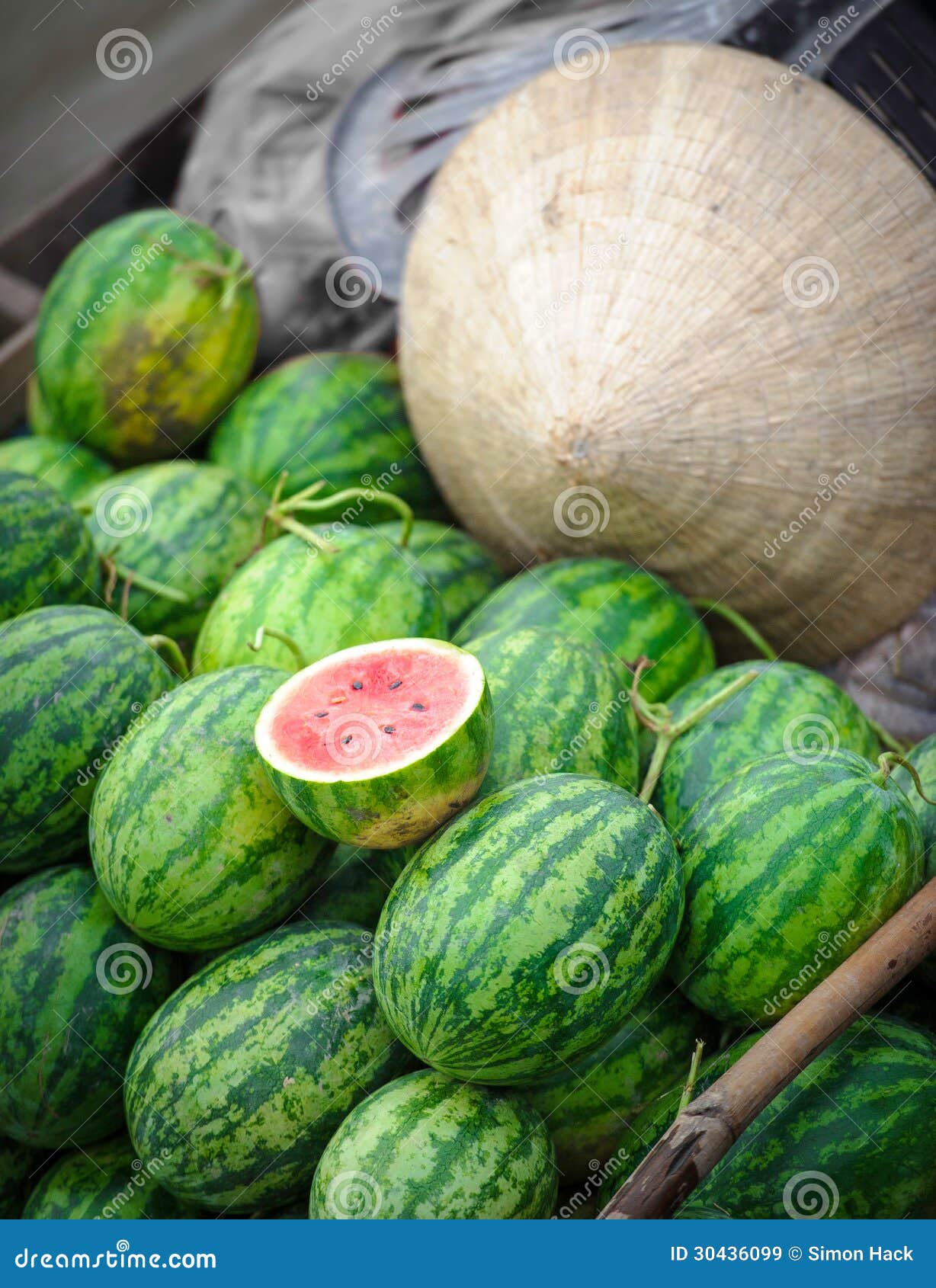 Watermelons and rice hat stock image. Image of watermelon - 30436099