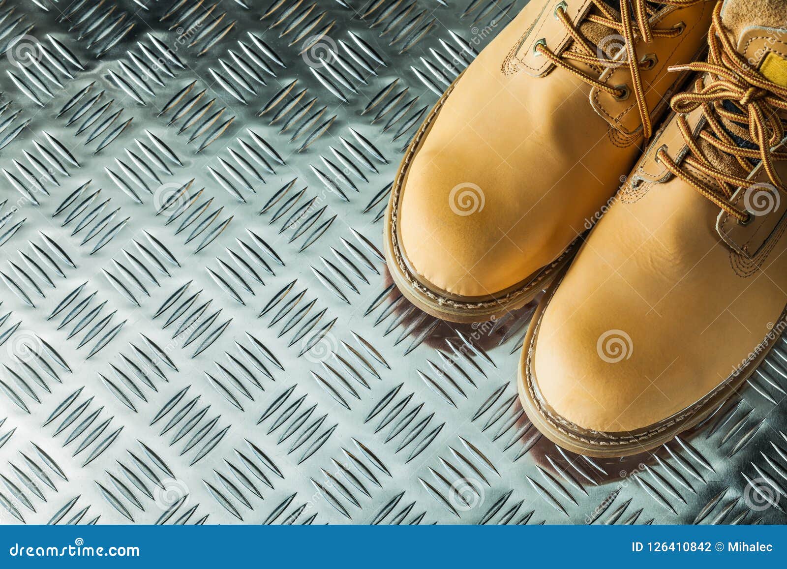 Waterproof Safety Boots on Corrugated Metal Plate Stock Photo - Image ...