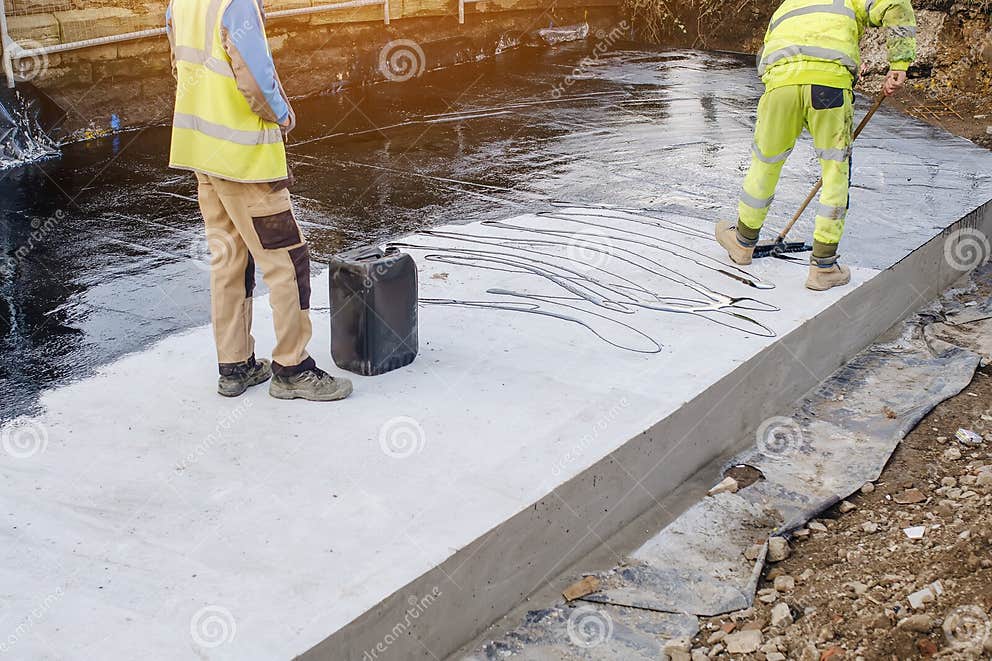 Waterproofing Coating. Builder Applying Waterproofing Bitumen Mastic on ...