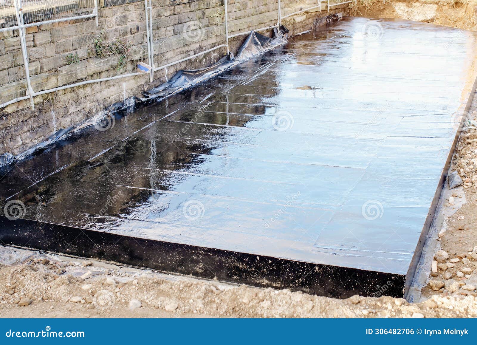 Waterproofing Coating. Builder Applying Waterproofing Bitumen Mastic on ...