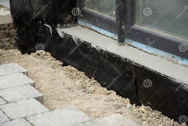 Waterproofing House Foundation with Spray on Tar and Roll Waterproofing ...