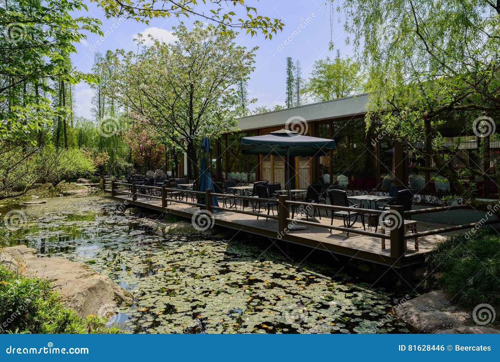 Waterside Restaurant with Planked Platform in Sunny Spring Stock Photo ...