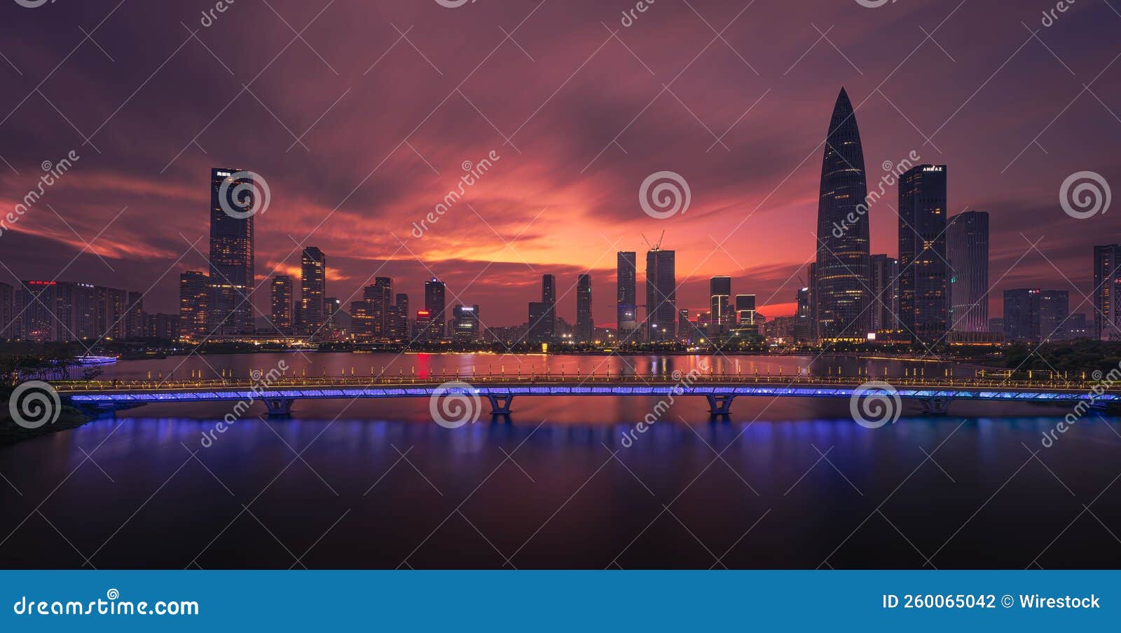 Waterside View of a Bridge before the Buildings of Shenzhen Under the ...