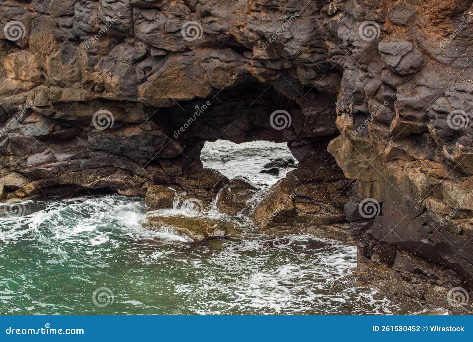 Waterside View of Waves Touching the Stones of a Cliff Stock Photo ...