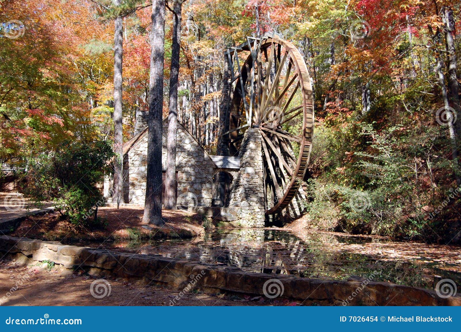 Waterwheel in the woods stock photo. Image of foliage - 7026454