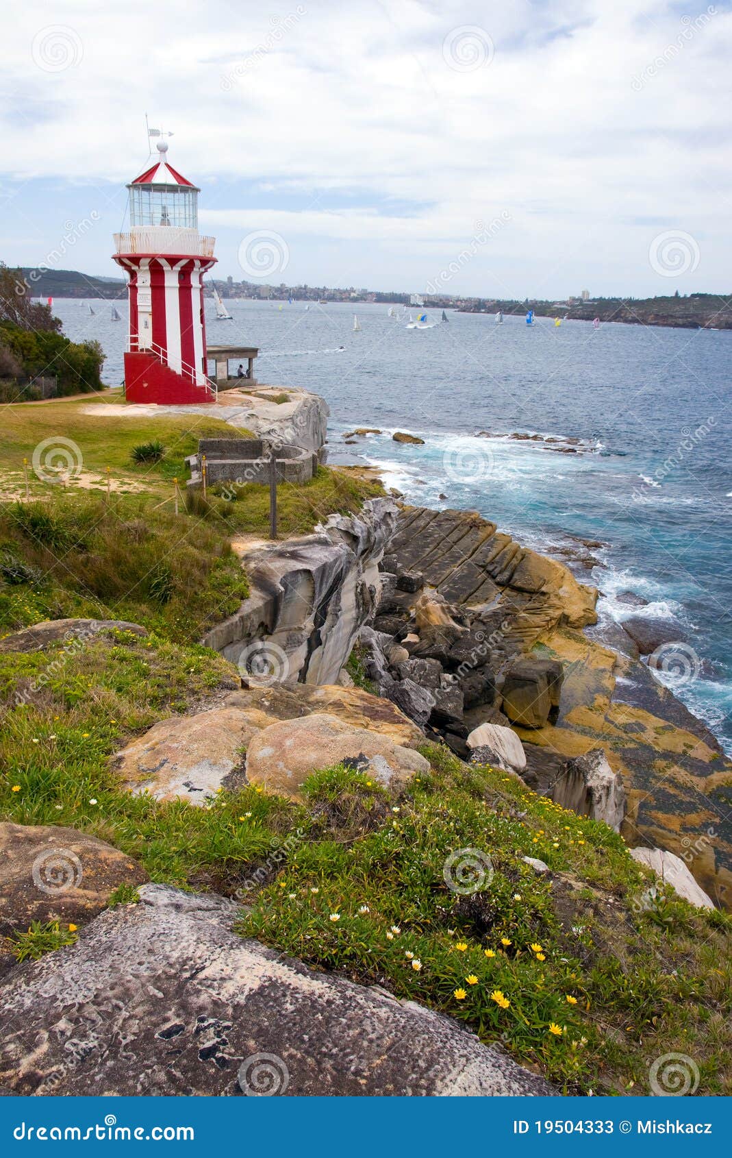 Lighthouse On Rocks Royalty-Free Stock Image | CartoonDealer.com #25191052