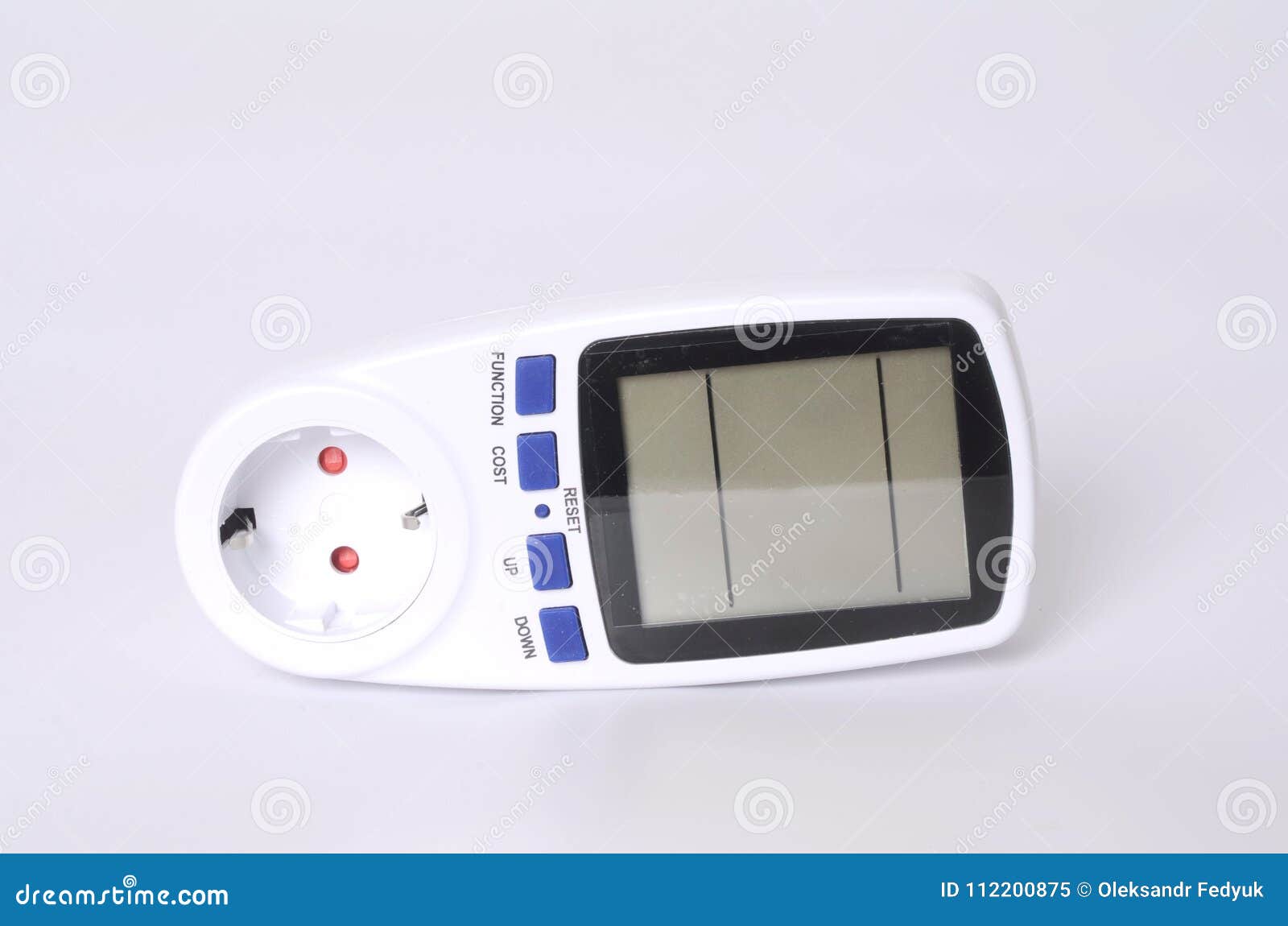 Watt Meter Plug in Operation on an Electrical Socket on the Wall. Stock ...