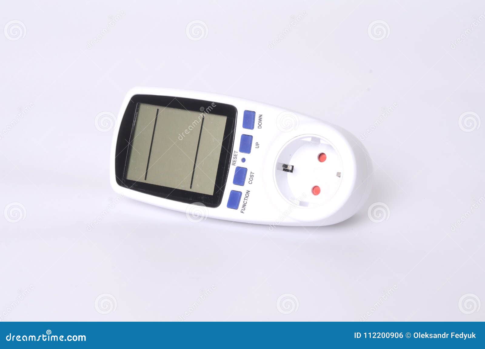 Watt Meter Plug in Operation on an Electrical Socket on the Wall. Stock ...