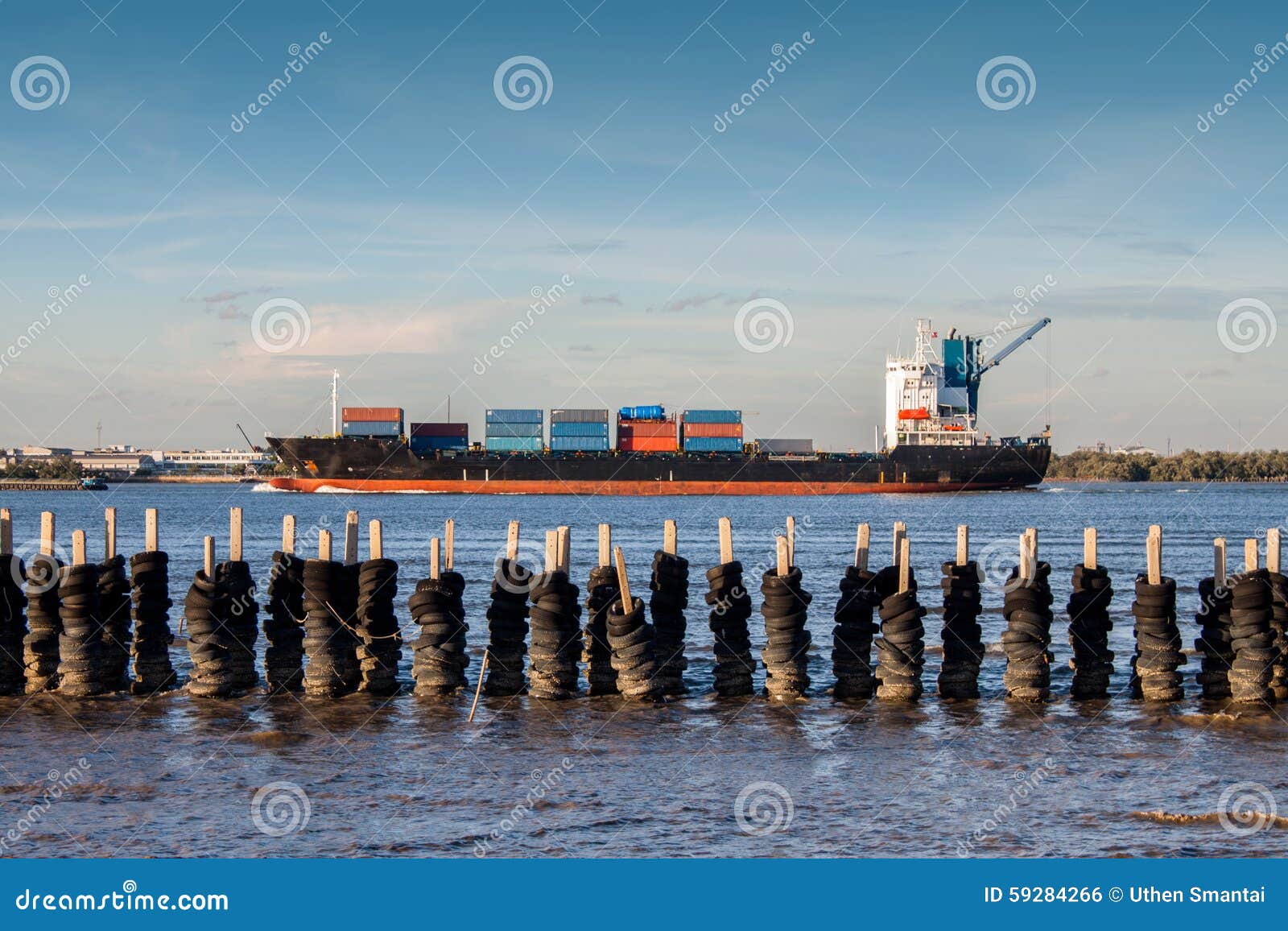 Wave Breaker and Cargo Ship Stock Photo - Image of vessel, lake: 59284266
