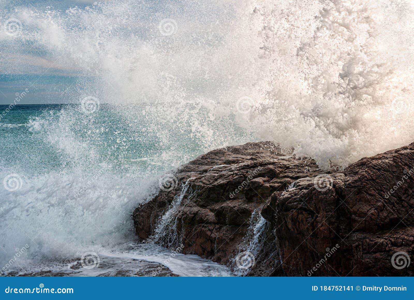 A Wave Breaking on a Coastal Rock Stock Image - Image of splashing ...